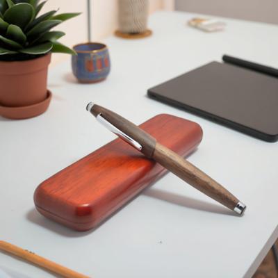 China Custom Logo Walnut Wooden Pen Box - Premium Executive Gift with Elegant Engraving for Your Brand or Name, Made From Solid Wood. for sale