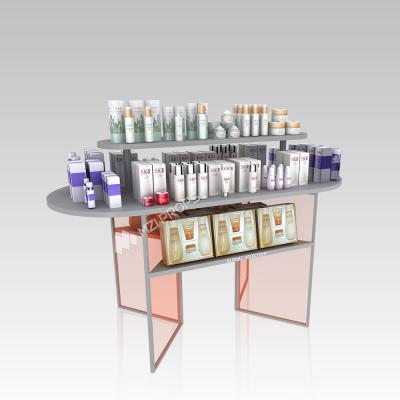 China Multi Layer Grey Skincare Promotion Table Cosmetic Display Rack For Beauty Shop Design And Retail Store Decoration for sale