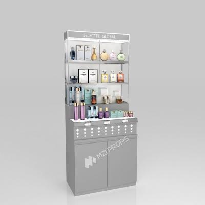 China Expositor de tienda de belleza, gris, de madera, con luces LED, para mostrador de tienda premium y mesa de tienda vanguardista en venta