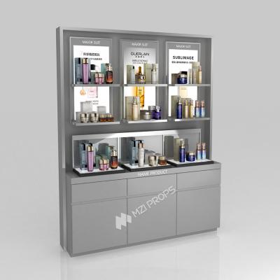 China Diseño de tienda de belleza, vitrina de madera gris para exhibición de marca, muebles de exhibición y mesa de exhibición que ahorra espacio en venta