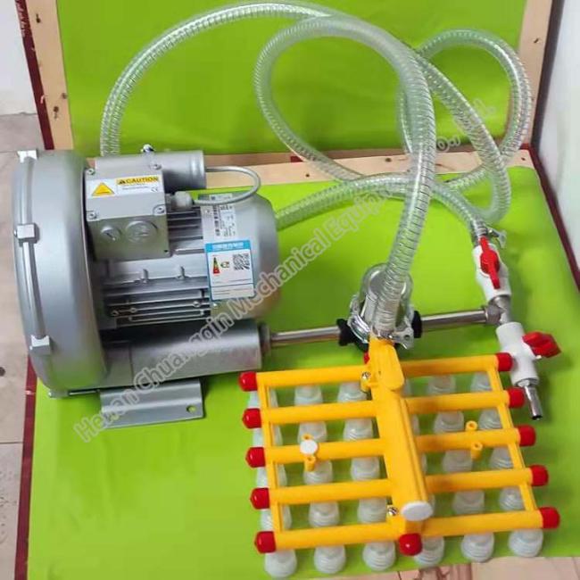 Egg Lifter machine handling multiple eggs simultaneously
