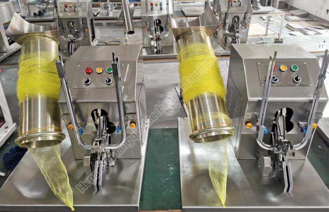 Close-up view of mesh bag clip machine components