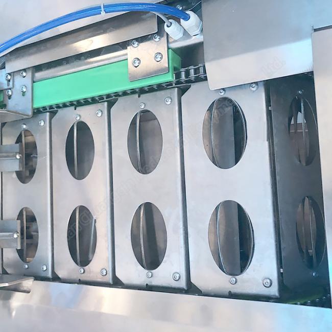 Egg separator machine side view showing stainless steel construction