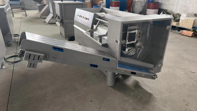 Industrial meat processing with cutting machine