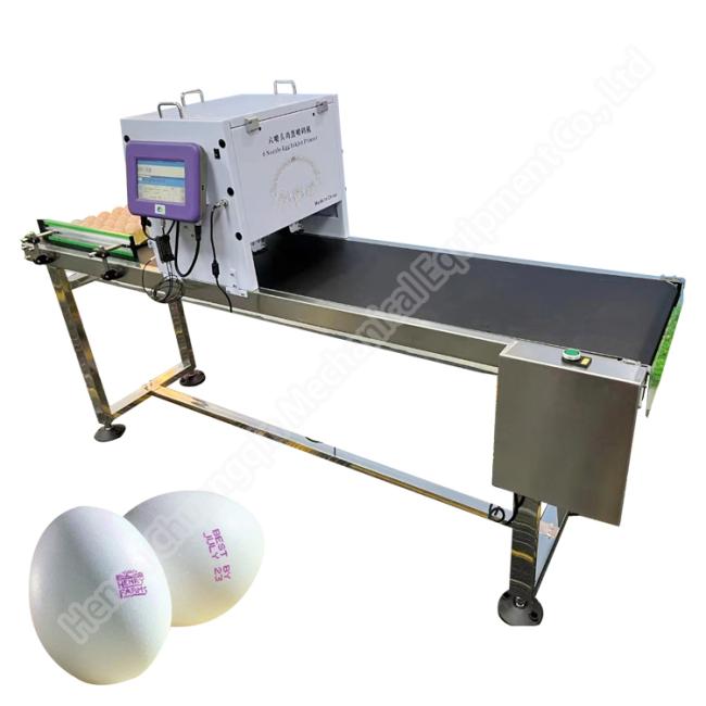 Close-up view of egg printing process