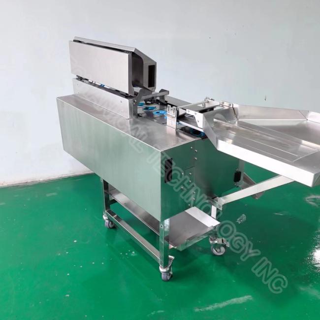 Close-up view of egg separator machine components