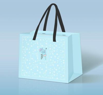 China christmas printed custom design shopping paper bag 250g c1s art paper,cheap paper bag with bow tie ribbon for sale