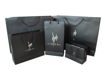 China 250g c1s luxury custom art paper shopping bag,custom c1s art paper material shopping bags with handles for sale