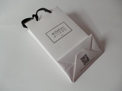 China custom luxury black c1s art paper matt laminated shopping bag with ribbon bow,offset printing shopping paper bag for sale