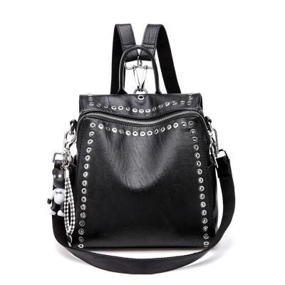 China Fast Fashion Black Backpack for Lady in Wash PU Soft Handbag Multi-function Luxury Cross Body Bag with Silver Stud for sale