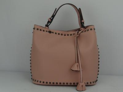 China Fashionable Design Shoulder Handbag for Ladies Pink Flounce Pendant Bags with Black Rivets Single shoulder and slant Bag for sale
