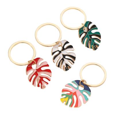 China Custom Logo Monstera Leaf Enamel Green Plant Girl Metal Zinc Alloy Keychains Fancy Imprint for Personalized Style for sale