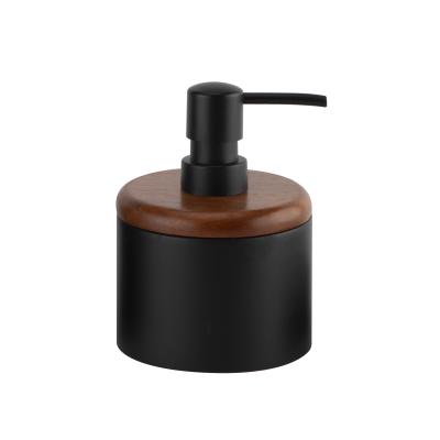 Cina Dispenser di sapone a poliresina di forma rotonda nero con copertura in legno di acacia in vendita