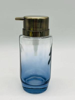 Cina Accessori da bagno in vetro blu Forma rotonda con effetto bolla Dispensatore di lavaggio a mano Sapone per bagno in vendita