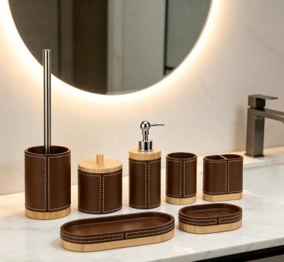 China Polyresin bathroom accessories set round with leather effect and bamboo resin lotion pump bottle bath set for sale