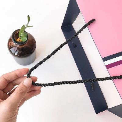 中国 洗濯できる21x11x27cm 350g紫外線CMYK 160gsmの非すの目なし紙袋 販売のため