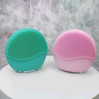 China OEM New Fashion Logo Branded Facial Deep  Cleansing Brush Electric Silicone Face Brush for sale