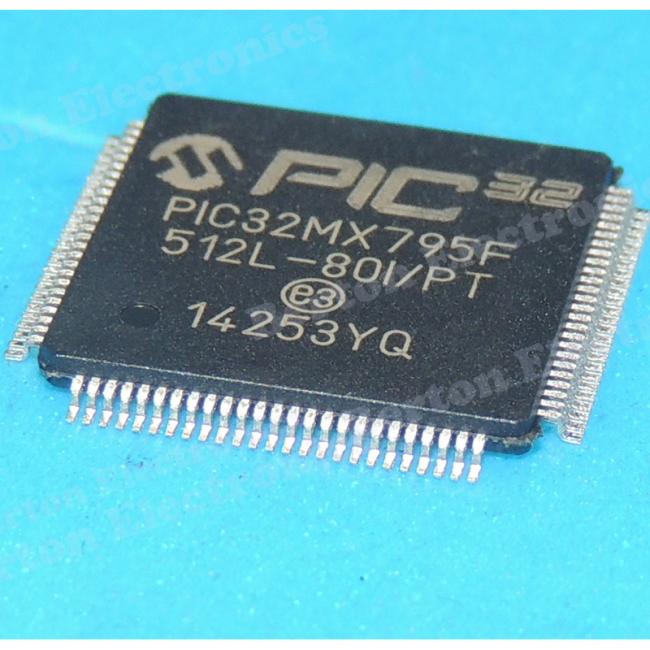 PIC32MX795F512L microcontroller chip and development board