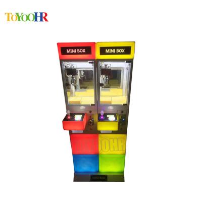 China Coin Operated Games Mini Doll Gift Vending Machine Arcade Claw Crane Machine for sale