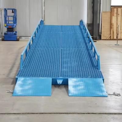 China Heavy-Duty Mobile Loading Ramp with Solid Tyres for Maximum Safety and Durability for sale