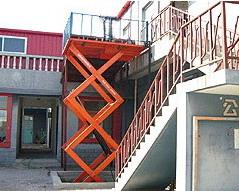 China Powerful Stationary Hydraulic Scissor Lift Table for Smooth and Safe Lifting of Heavy Goods for sale