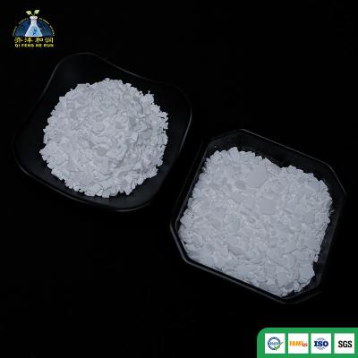 China 74%-77% Purity Dihydrate Calcium Chloride Flakes White for Road Deicing with pH 6-11 for sale