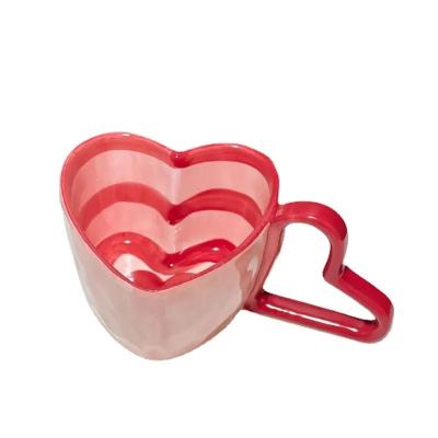 China 300ml Handmade Coffee Cups Lovely Mug with Unique Handle Afternoon Tea Cup Gift Couple Ceramic Heart Shaped Coffee Mug for sale