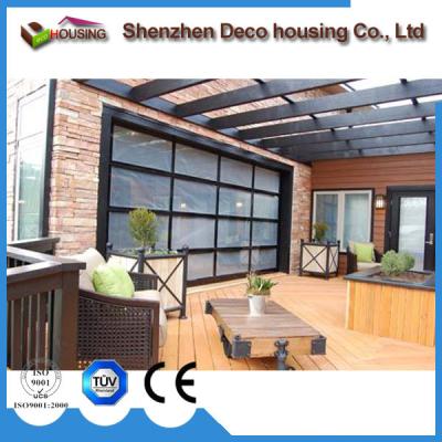 China Customized automatic sectional folding glass 8x7 garage door panels sale for sale