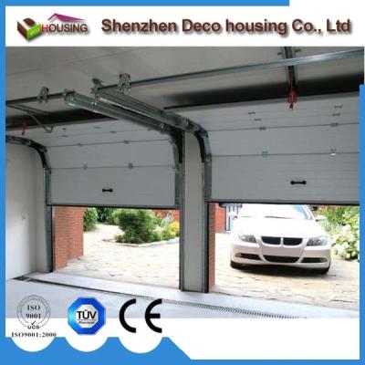 China Hurricane resistance 40mm insulated panel sectional overhead garage door with finger protection for sale