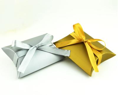 China custom nice glitter paper pillow shape gift box with ribbon with handle for sale