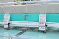 China Multi Needle Computerized Embroidery Machine 9 Needles 24 Head Embroidery Machine for sale