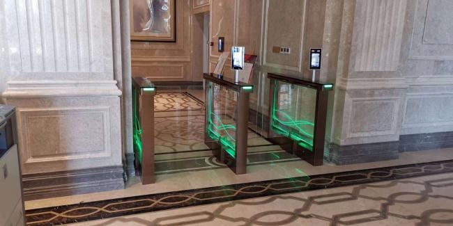 KEMAISI Speed Gate installed in modern building entrance showing professional installation