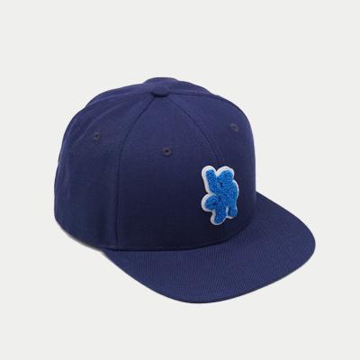China Personalized Flat Brim Snapback Hats Snap Button Adjustable Navy Blue Towel Embroidered for sale