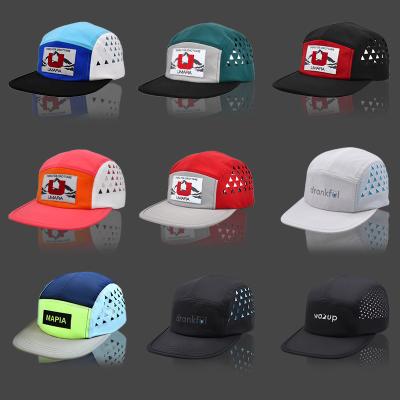 China Waterproof Laser Cut Drilled Hole 5 Panel Camper Hat Lightweight Nylon Running Mesh Cap for sale