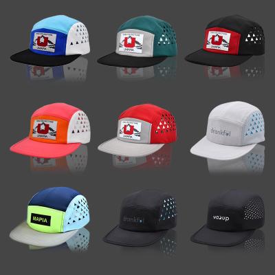 China Waterproof Laser Cut Drilled Hole 5 Panel Camper Hat Lightweight Nylon Running Mesh Cap for sale