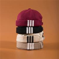 China Custom Embroidered Brimless Baseball Cap 6 Panel Cotton Adjustable Rope Closure for sale