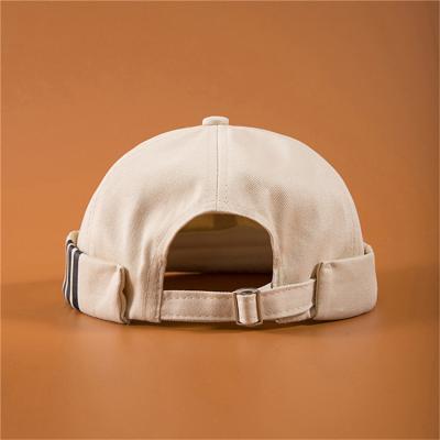 China High Quality Embroidered Rolled Caps,Customized Plastic Buckle Docker Caps,Washed Black Brimless Hats for sale