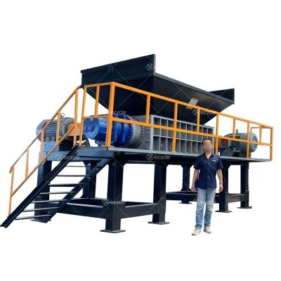 China Robust Double Shaft Shredder for Demolition and Recycling Versatile Double Shaft Shredder for Plastic Bottles and Paper for sale