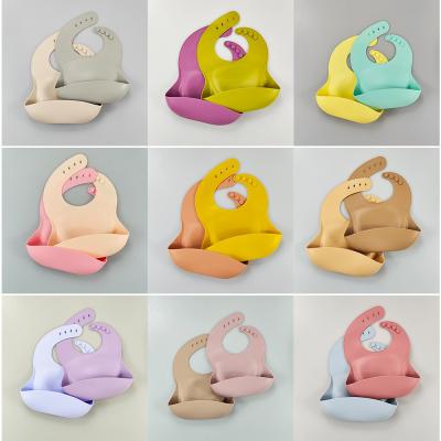 China Factory Offer EN-71 Certification Water Proof Silicone Bibs Food Grade Baby Feeding Bibs for sale