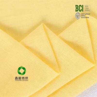 China BCI BetterCotton voile tabby yellow color  fine plain fabric for apparel dress for sale