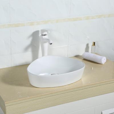 China Polished Surface Counter Top Bathroom Sink White And Black Color Triangle Surface for sale