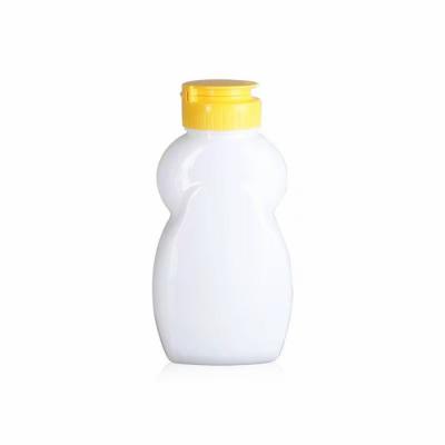 Cina La chiara compressione di plastica su misura imbottiglia piccolo Honey Jugs riutilizzabile 110ml in vendita