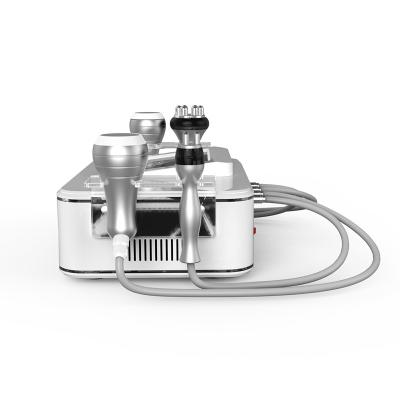 China 2019 newest Vacuum Cavitation System 40KHz Cavitation+RF Body Slimming Beauty Machine / Equipment with 4 Handle for sale