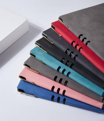 中国 柔らかいカバー PU レザーノートブック 弾性ペンホルダー パーソナライズされた紙ノートブック 販売のため