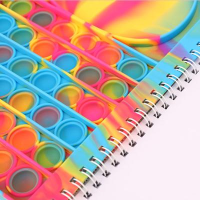 Cina Popolare A5 Cute Animal Pattern Silicone Colorato Push Sensory Bubble Fidget Pop Notebook Per Bambini in vendita