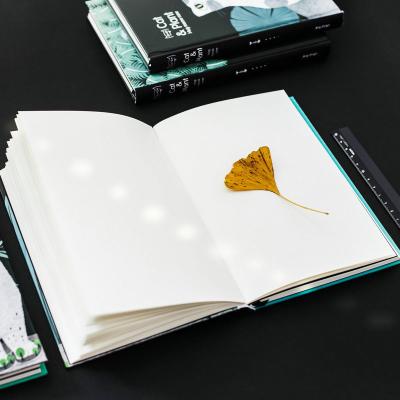 Cina Notebook dotato con fascia elastica e griglia di punti in vendita