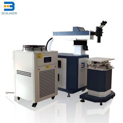 Cina macchina tenuta in mano della saldatura a laser 380V, saldatrice della muffa del laser 500W in vendita