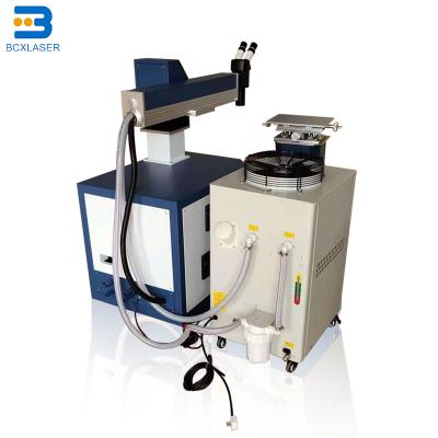 Cina macchina tenuta in mano della saldatura a laser 380V, saldatrice della muffa del laser 500W in vendita