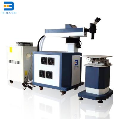 Cina macchina tenuta in mano della saldatura a laser 380V, saldatrice della muffa del laser 500W in vendita