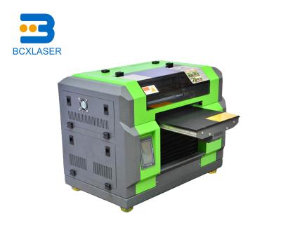 China Flatbed Color UV Printer Multifunctional A3 Automatic DTG Printing Mobile Phone Case for sale
